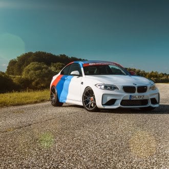 Custom White BMW 2-Series Embraced with Carbon Fiber | CARiD.com Gallery