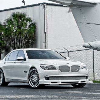 Stylish BMW 750Li on Black Custom Wheels by Exclusive Motoring — CARiD ...