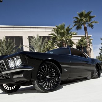 Stunning Donk Detected: Red Buick Riviera with Chrome Elements — CARiD ...