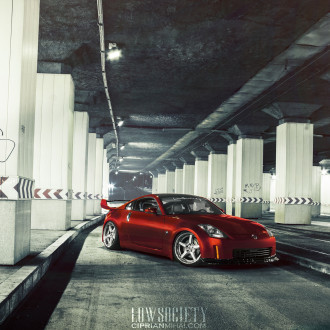 Red Nissan 350Z Boasting Red Buttoms and Liberty Walk Body Kit | CARiD ...