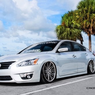 Modified Nissan Altima with Air Suspension and Sport Body Kit — CARiD ...
