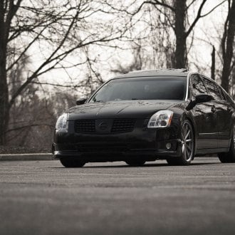 Stanced and Sporty: Nissan Maxima Shod in Chrome Rohana Wheels | CARiD ...