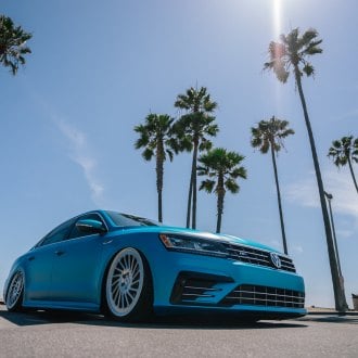 Bold Volkswagen Passat on Custom Wheels — CARiD.com Gallery
